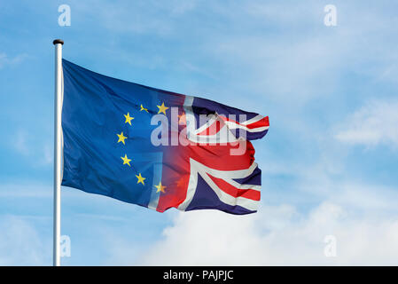 Merging european and british flag with lightning bolt in front of blue ...