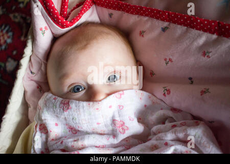 veiled baby with blue eyes looking at camera Stock Photo - Alamy