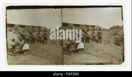 A soldier-cobbler mending boots in a Russian redoubt Stock Photo - Alamy