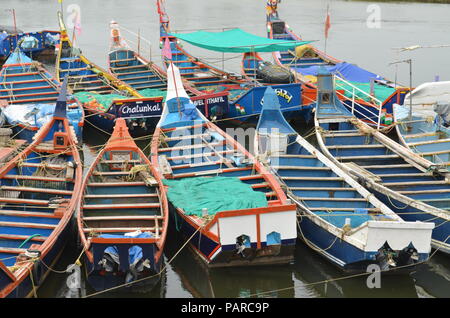 Many crowded fishing boats Stock Photo - Alamy