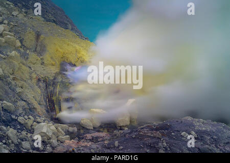 Blue sulfur flames and Sulfur fumes from the crater of Kawah Ijen ...