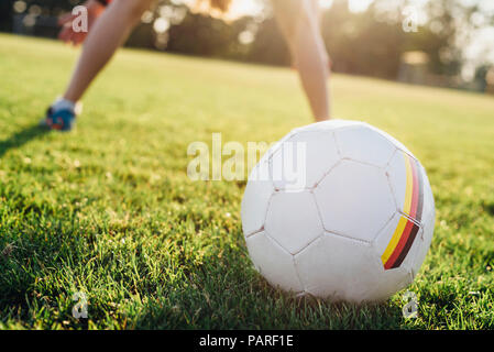 Children play flag football on a mini flag football field, set up in ...