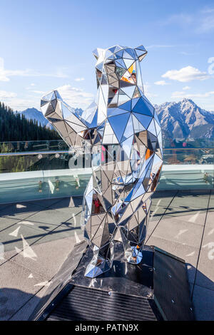 The mirror bear statue at the summit building on Sulphur Mountain in ...