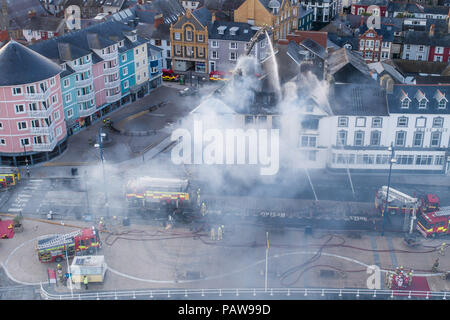 A fireman from the Mid-Wales Fire and Rescue Service turns on the water ...