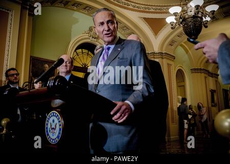 Senate Minority Leader Chuck Schumer, D-N.Y., right, and Sen. Tim Kaine ...