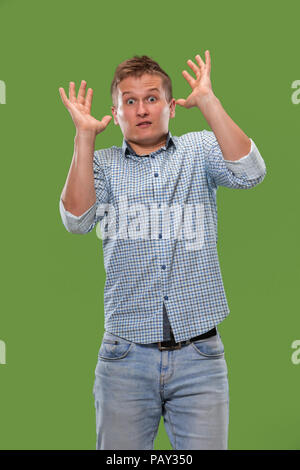 A view of a shocked young businessman isolated on white background ...