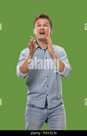 The young attractive man looking suprised Stock Photo - Alamy