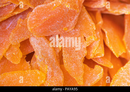pile of sun dried raw papaya slices or chunks, cut into pieces and ...