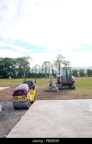 Rural construction. Building a stable base within grazing paddocks ...
