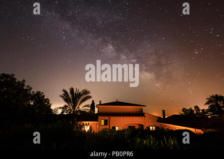 The spanish house under starry night sky Stock Photo - Alamy