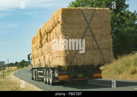 Transporting bales of straw by lorry - UK Stock Photo - Alamy