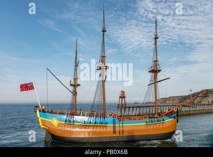 A replica of the HMS Bark Endeavour entering Whitby harbour Stock Photo ...