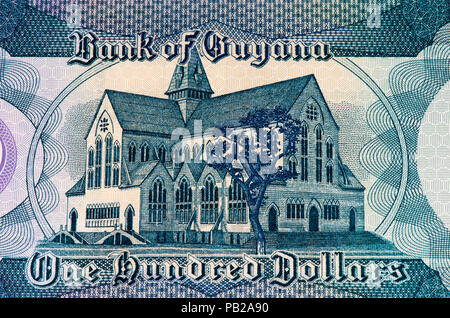 100 Guyanese dollars bank note. Guyanese dollar is the national ...