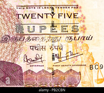 25 Mauritian rupees bank note. Mauritian rupee is the main currency of ...