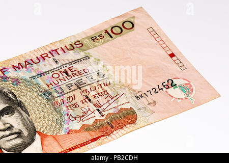 100 Mauritian rupees bank note. Mauritian rupee is the main currency of ...