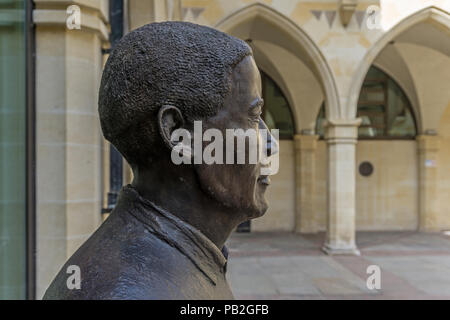 A statue of Walter Tull in courtyard of Northampton Guildhall; a ...