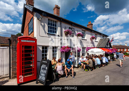 A typical traditional English country pub or inn in the village of ...