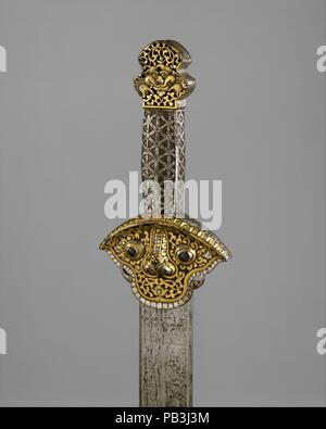 A sword, 16th century Double-edged blade with long fullered ricasso ...
