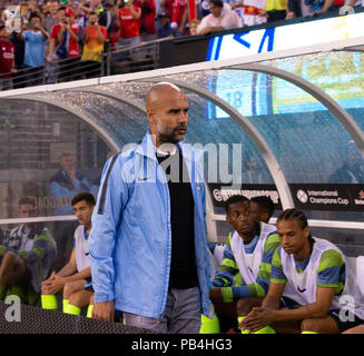 Pep Guardiola attends to Manchester City Press Conference at Santiago ...