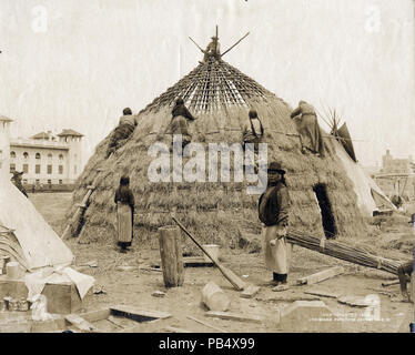 1852 Wichita Indian group building a lodge in the Department of ...