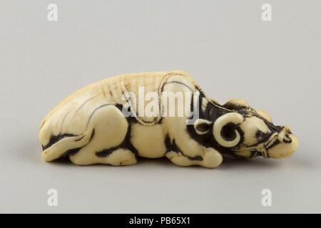 Netsuke of Ox. Culture: Japan. Dimensions: H. 7/8 in. (2.2 cm); W. 2 in ...