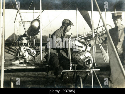 Pilot Walter Brookins and letter carrier F.W. Hagermeyer load mail onto ...