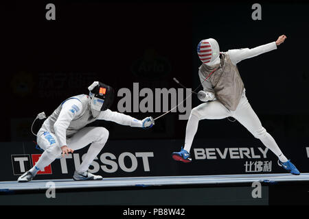 United States' Alexander Massialas (R) fights against Italy's Tommaso ...