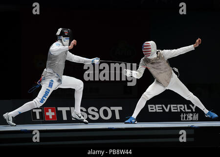 United States' Alexander Massialas (R) fights against Italy's Tommaso ...