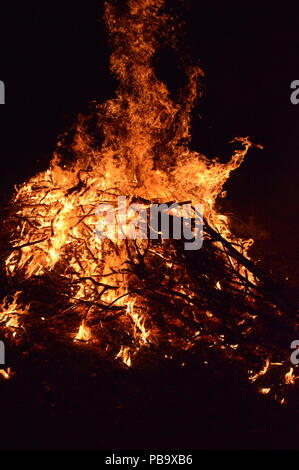 Big fire at night. Fire in nature. Easter fire. Clouds of smoke Stock ...