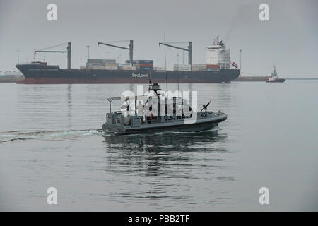 US Navy The U.S. Navy patrol boat USS Firebolt (PC 10) sits moored in ...
