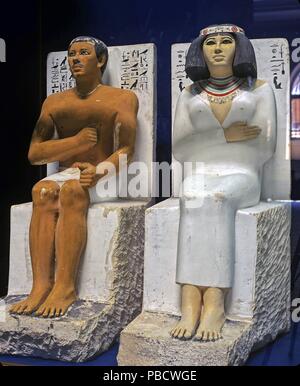 painted limestone statues of Rahotep and his wife Nofret at The ...