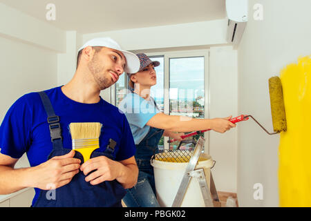 Couple renovate their living room from white to yellow with paint stick ...