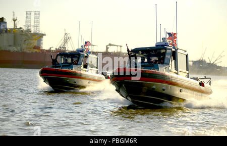 A Coast Guard 29-foot Response Boat-Small II boatcrew from Station Fort ...