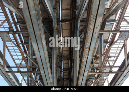 Symmetrical view of the steel truss bridge for trains across the river ...