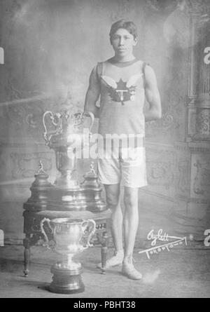 A photograph of Tom Longboat, a Canadian long-distance runner, known ...