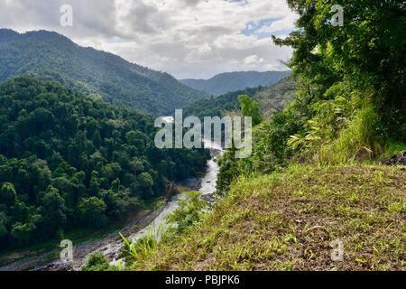 A scenic view of the Johnstone river and mountains at the North ...