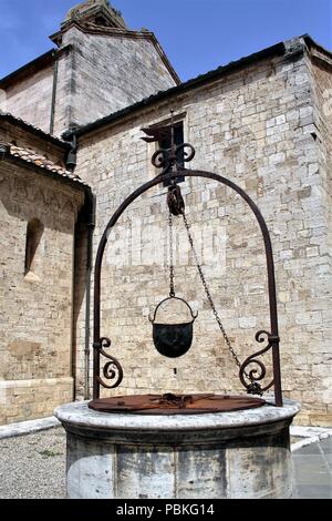 Wishing well in a courtyard, in the medieval village of Eze, near ...