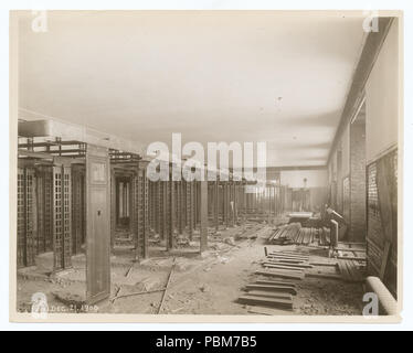 Interior work : construction of bookcases in the stacks.; Interior work ...