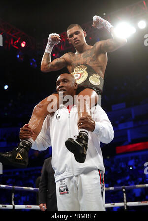 Conor Benn, on the shoulders of his father Nigel, celebrates victory ...