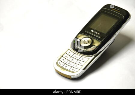 Old Huawei mobile device, older mobile phone Stock Photo - Alamy