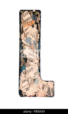 financial news newspaper cut up into confetti to make the captal letter ...
