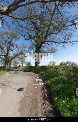 View of fly-tipping in a rural layby at Redwither Lane, near the ...