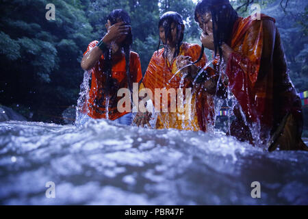 Kathmandu, Nepal. 30th July, 2018. A Hindu worshipper or pilgrim also ...