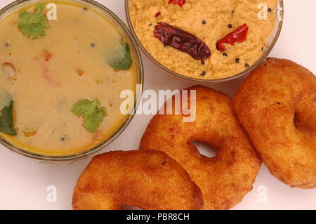 uzhunnu vada or urad dal fritters are a common snack in south india ...
