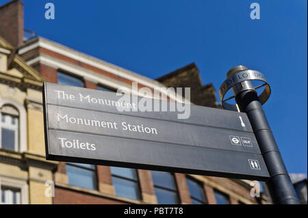 London tourist attraction signpost with direction signs in London ...