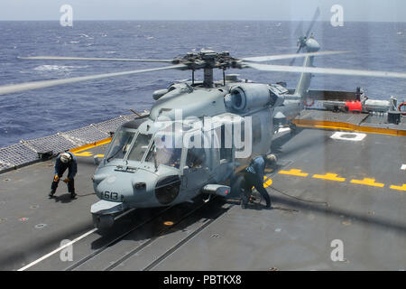 The Canadian coastal defense vessel HMCS Nanaimo (MM 702) transits the ...