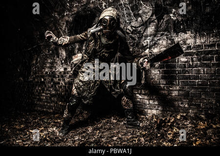 Post apocalyptic underground creature in gas mask Stock Photo - Alamy