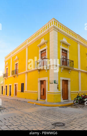 Yellow building in Palenque, Mexico Stock Photo - Alamy