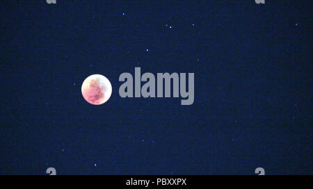 The half moon seen in the darkness Stock Photo - Alamy
