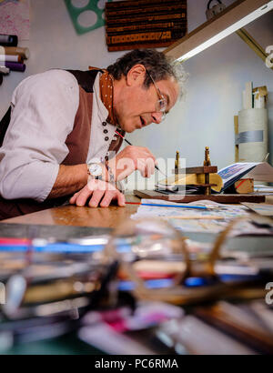 Book edge artist Martin Frost at work in his Worthing studio Stock ...